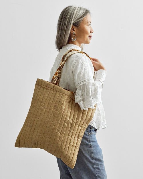 Manelleh - håndlavet af kvinder